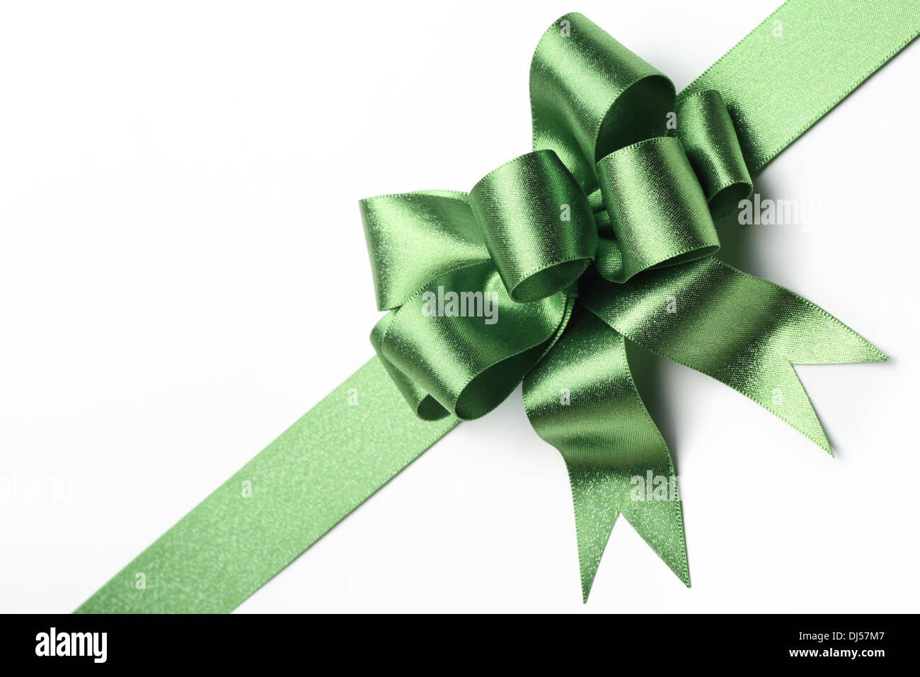 Green ribbon bow isolated on white background Stock Photo - Alamy