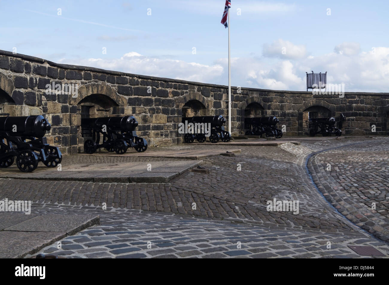 Row of cannons at the top section of Edinburgh Castle in Scotland ...