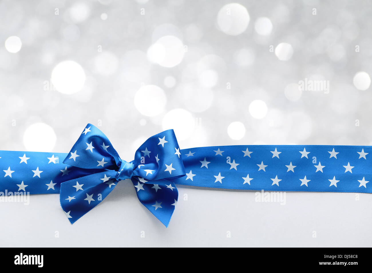 Blue ribbon bow with bokeh,Christmas decoration Stock Photo - Alamy