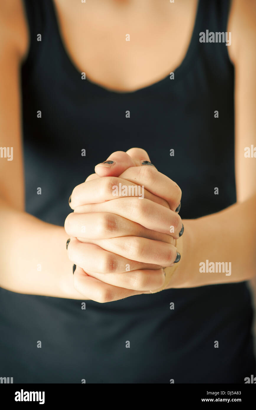 Hands of christian woman praying Stock Photo - Alamy