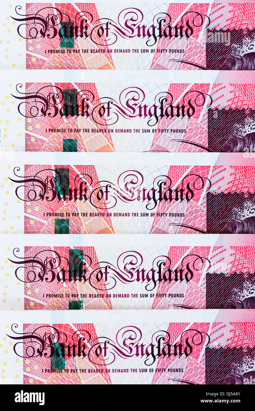 Bank of England writing on English fifty pound notes pattern Stock ...
