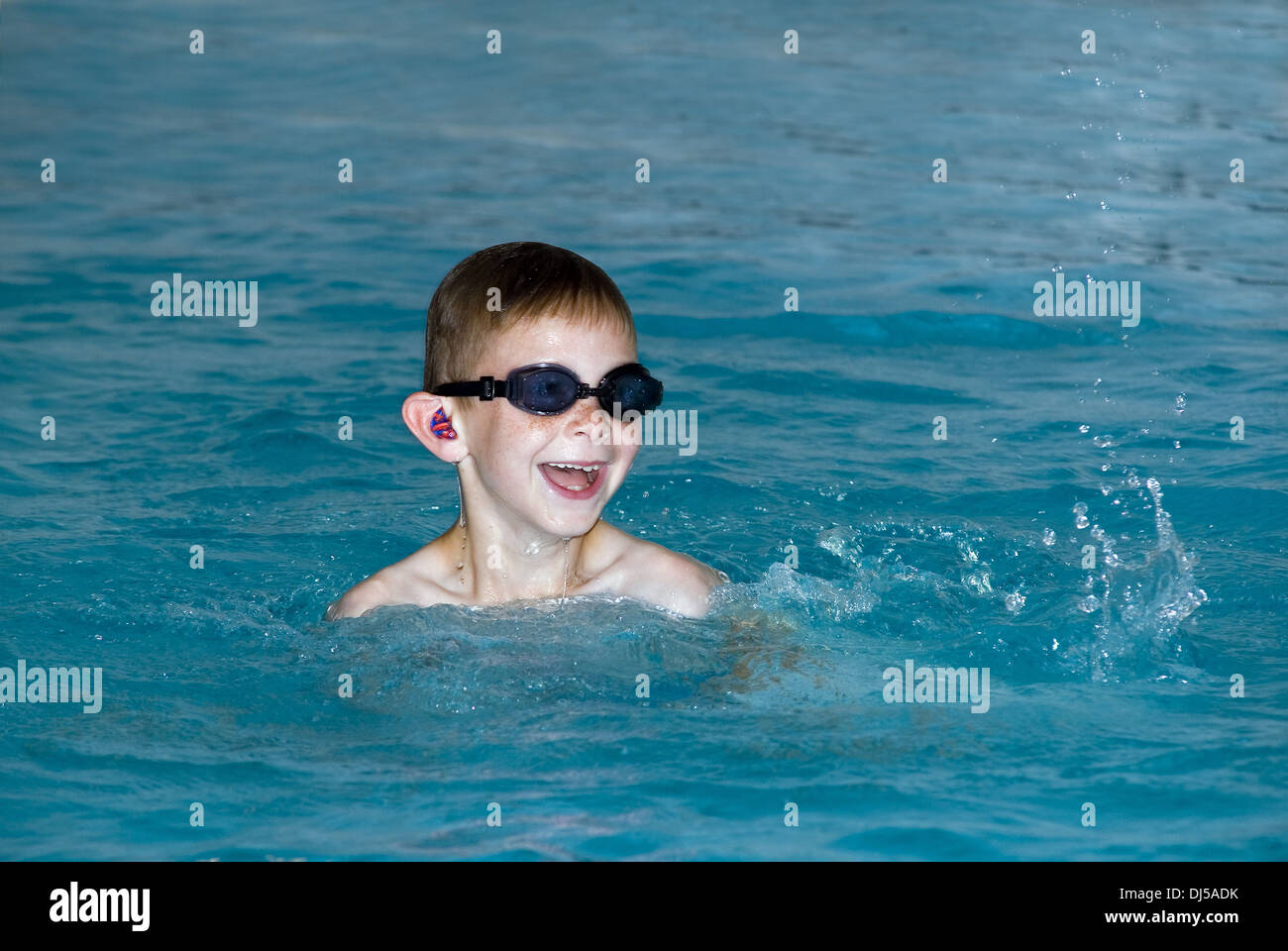 Little boy in a swimming pool Stock Photo - Alamy