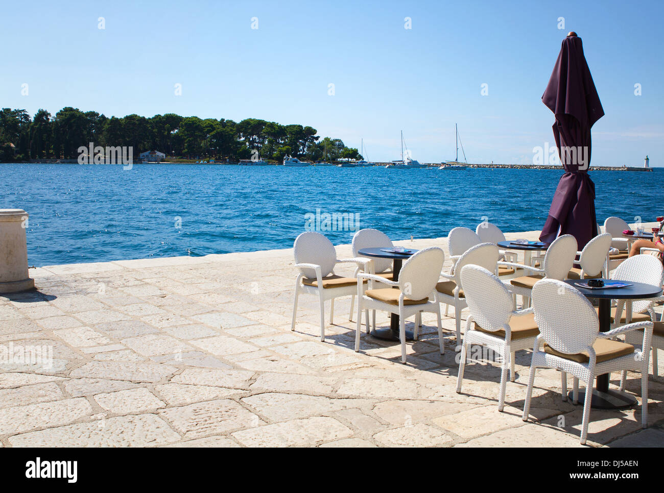 View of empty outdoor cafe Stock Photo - Alamy