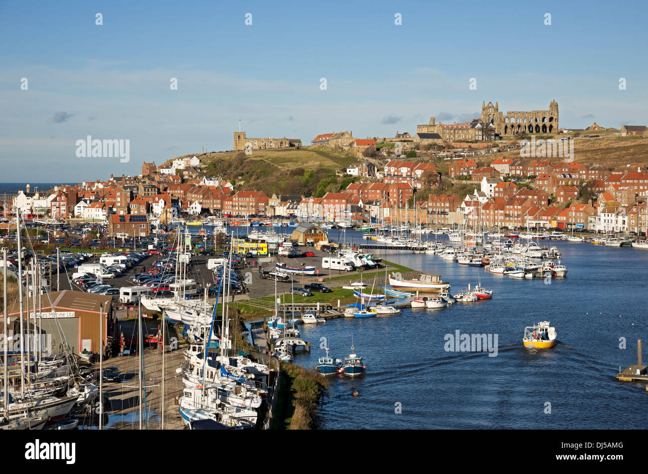 View looking along River Esk towards the town harbour and Abbey in ...