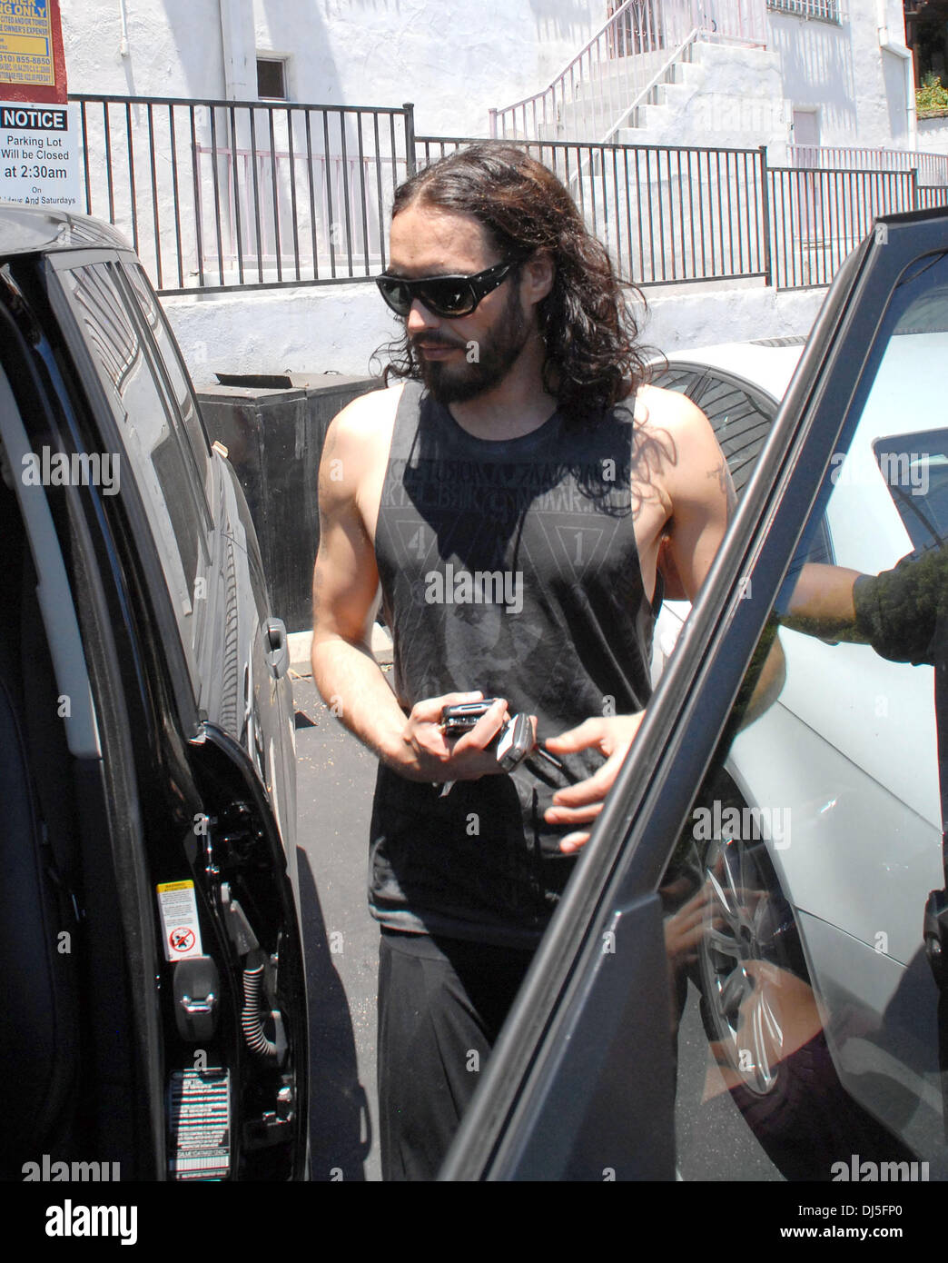 Russell Brand gets into his car in Sunset Plaza Los Angeles, California ...