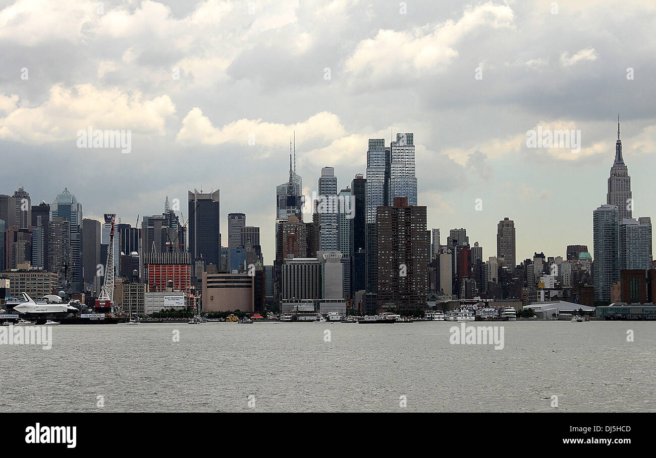 The NASA space shuttle prototype Enterprise is lowered by crane into ...