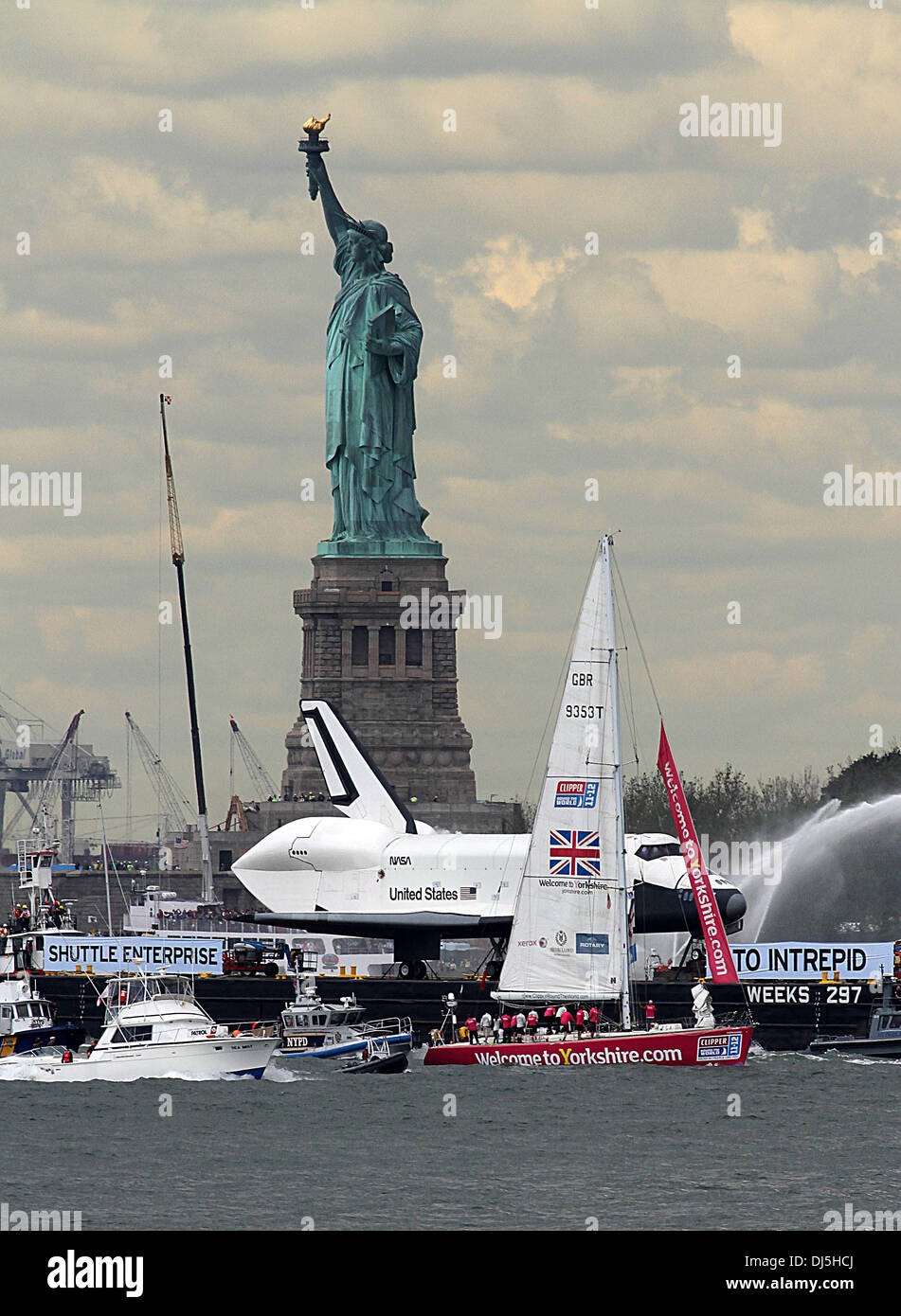 The NASA space shuttle prototype Enterprise is lowered by crane into ...