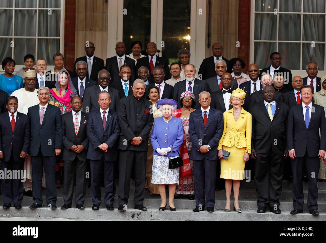 Britain's Queen Elizabeth II, front row centre, poses for pictures with ...