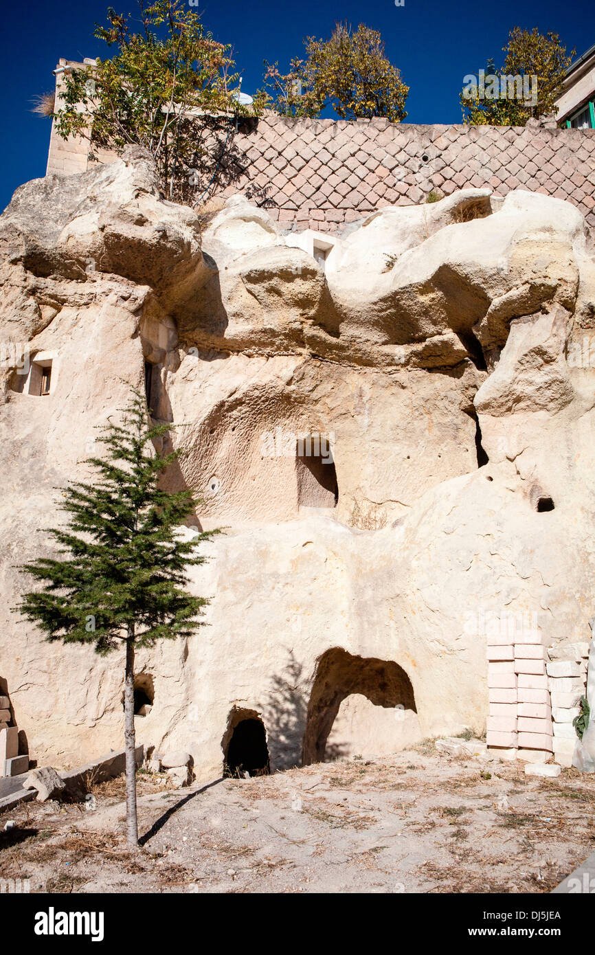 Ancient cave dwellings in the village of Sinassos in Cappadocia ...
