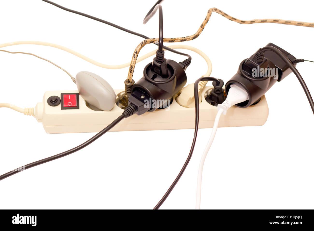 Surge Protector overloaded 10 consumers of electricity Stock Photo - Alamy