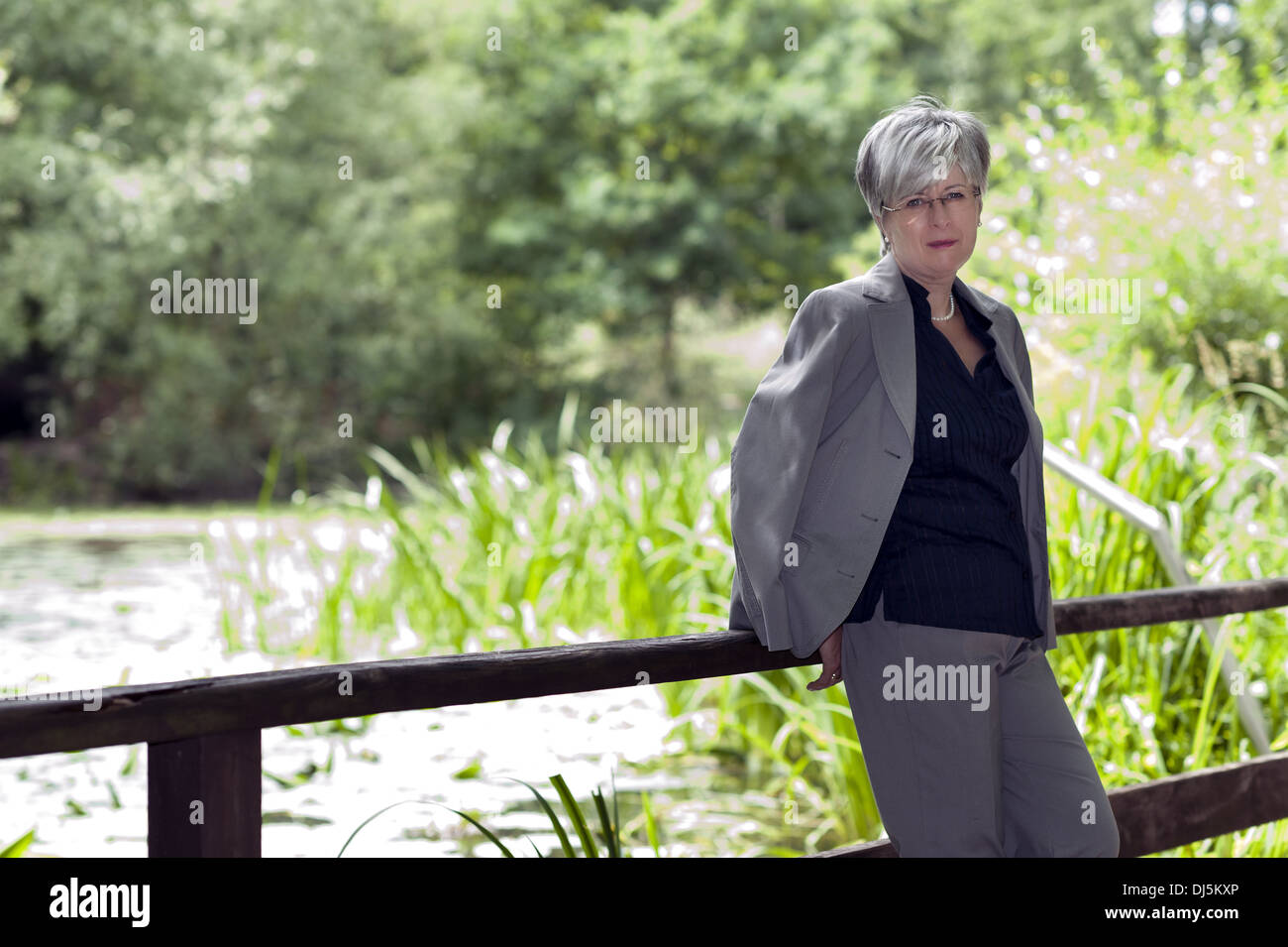 Face on railings hi-res stock photography and images - Alamy