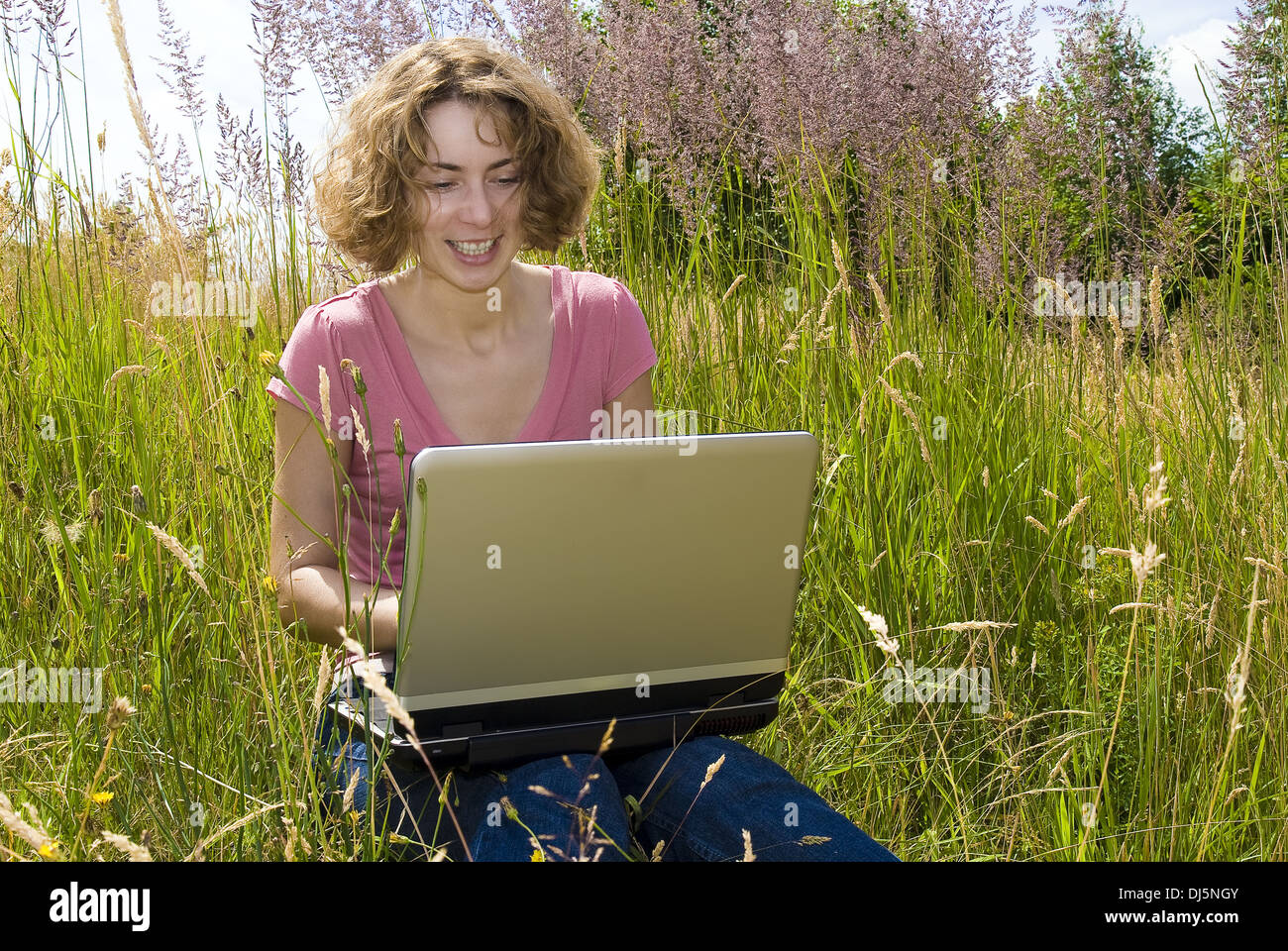 Girl and laptop outdoor Stock Photo - Alamy