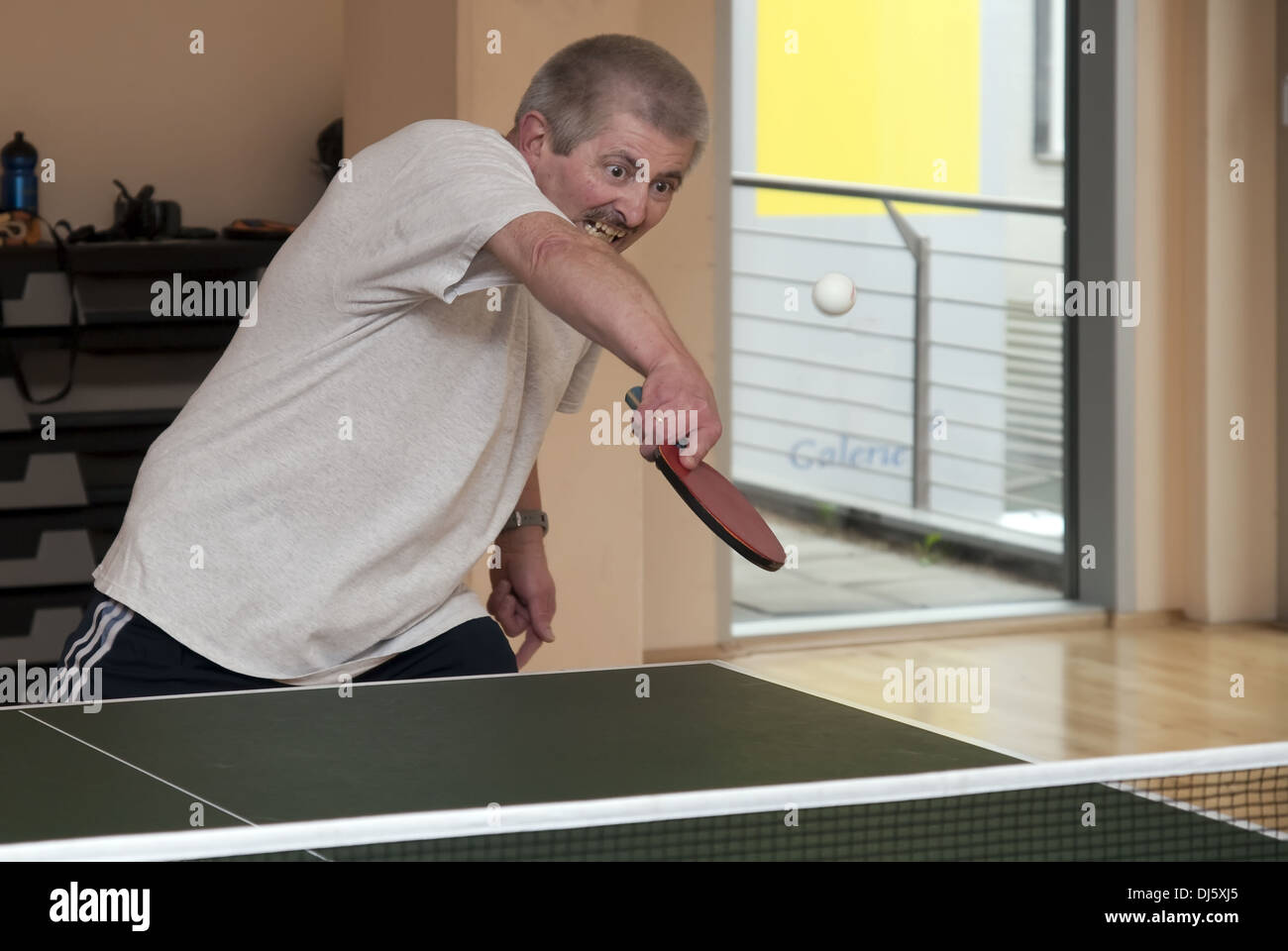 Old man table tennis hi-res stock photography and images - Alamy