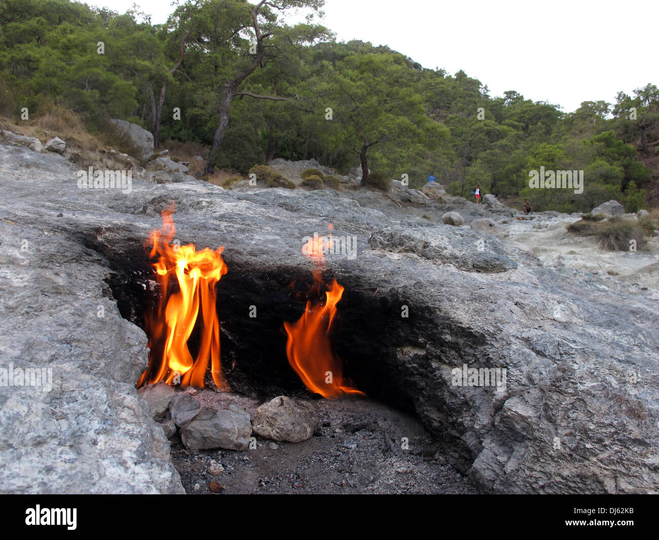 The so called eternal flame flickers between some rocks in the national ...