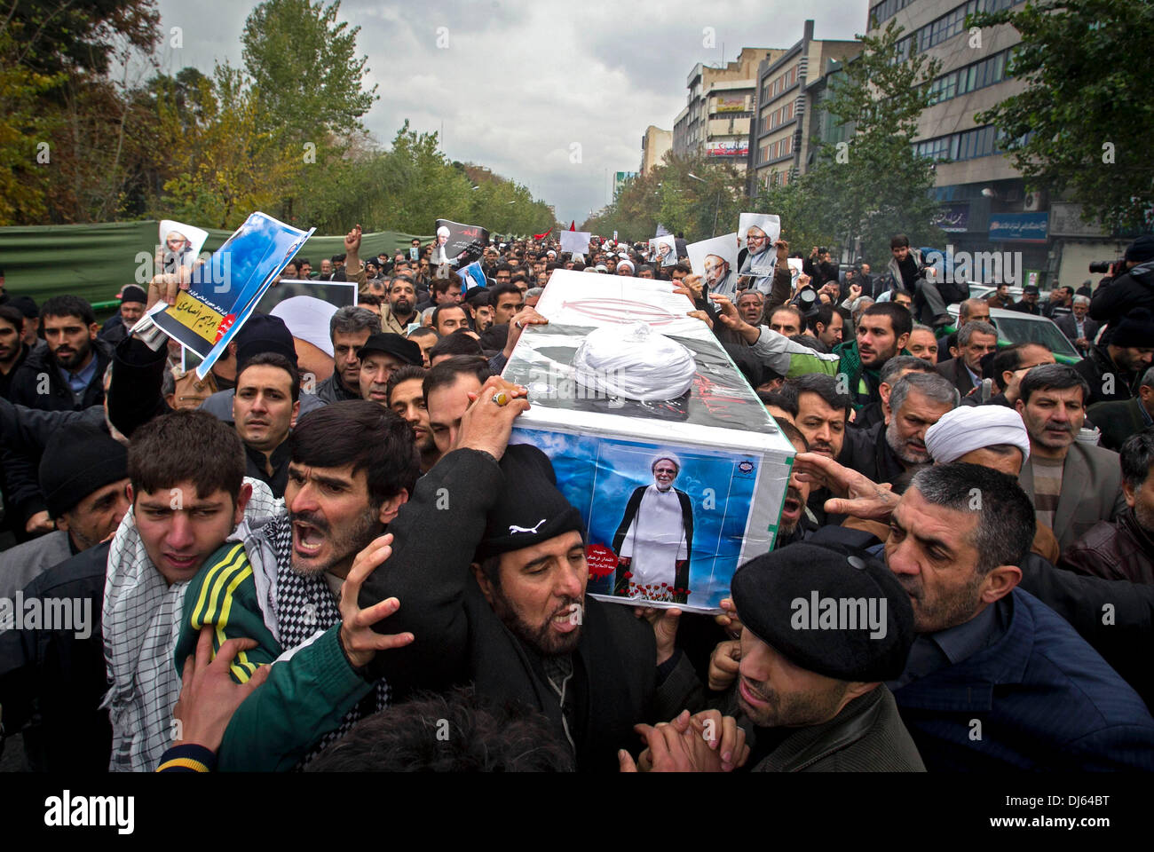 Tehran, Iran. 22nd Nov, 2013. People carry the coffin of Sheikh Ibrahim ...