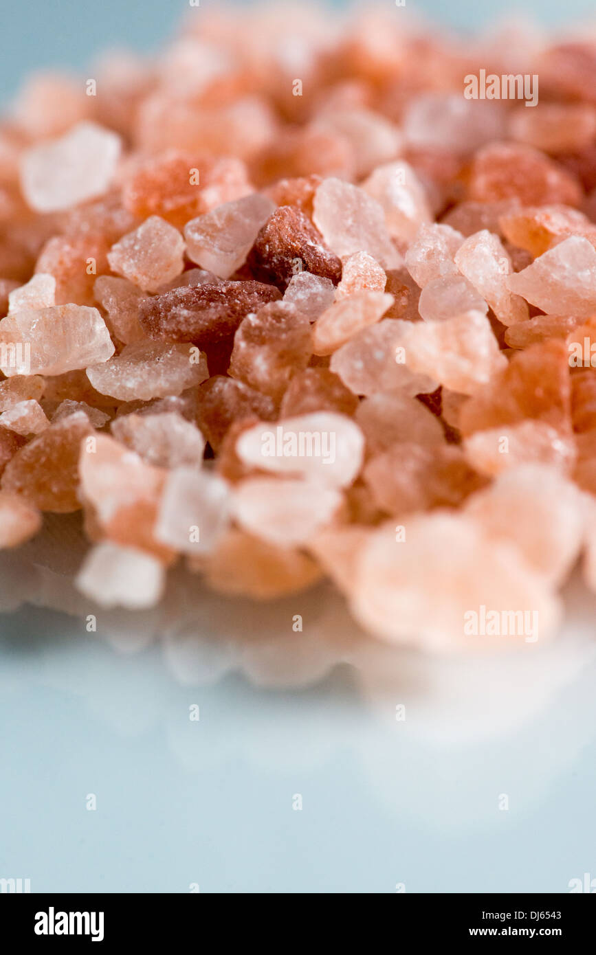 Himalayan pink salt on white background Stock Photo - Alamy