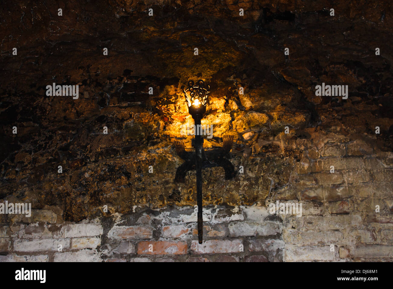 Torch on wall old castle hi-res stock photography and images - Alamy