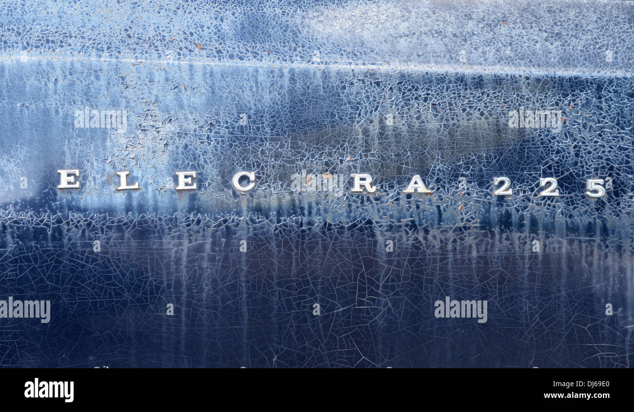 Streaked and peeled paint and name tag with missing letters on an ...