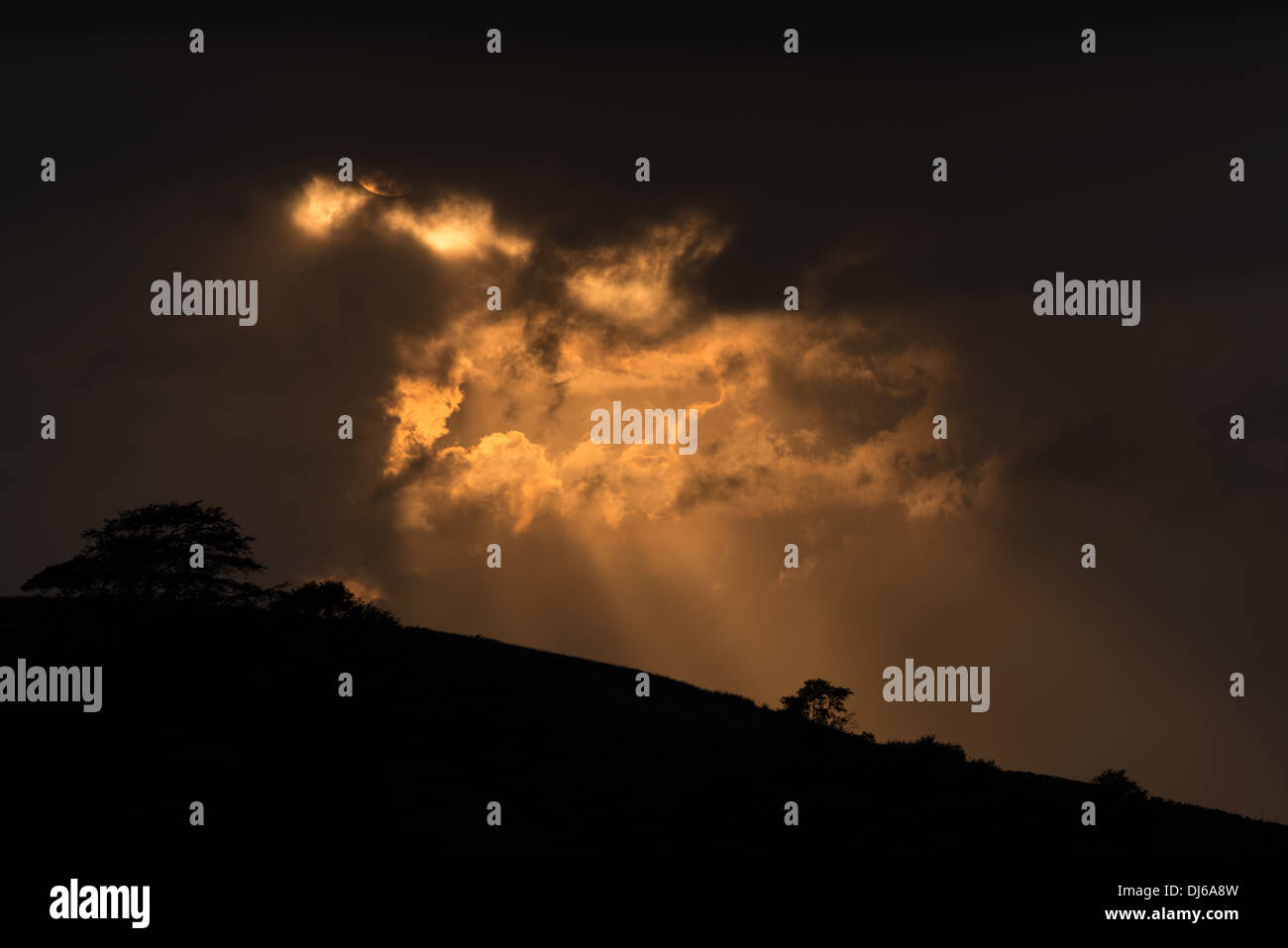 Light through dark skies hi-res stock photography and images - Alamy