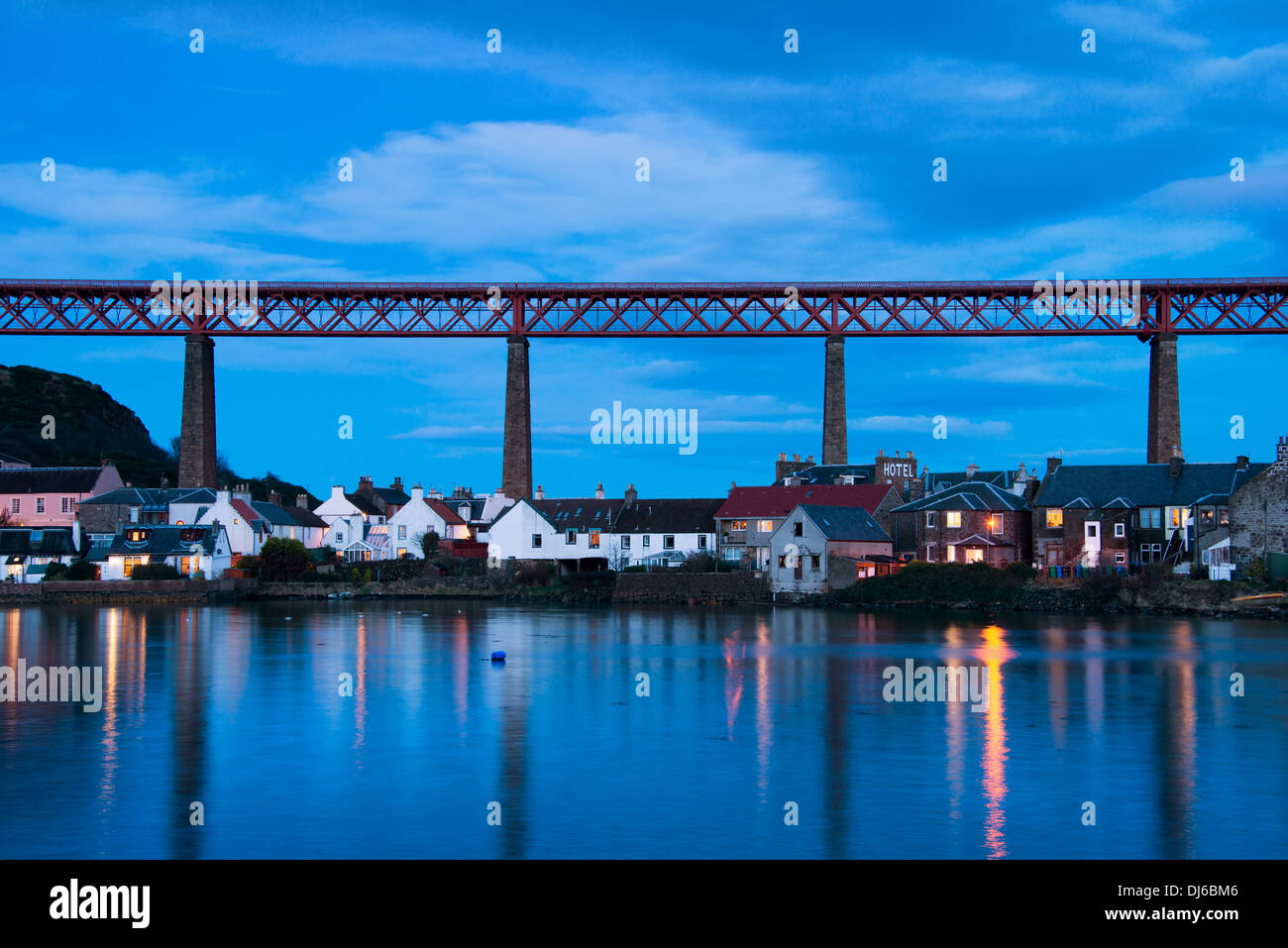 Forth railroad bridge over North Queensferry village near Edinburgh ...
