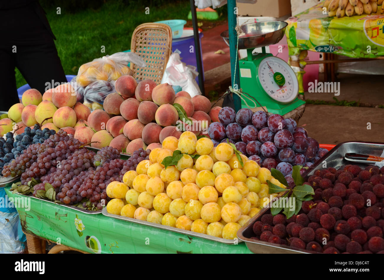 Fruit stall selling various fresh fruits at Kunming Shilin, Yunnan ...