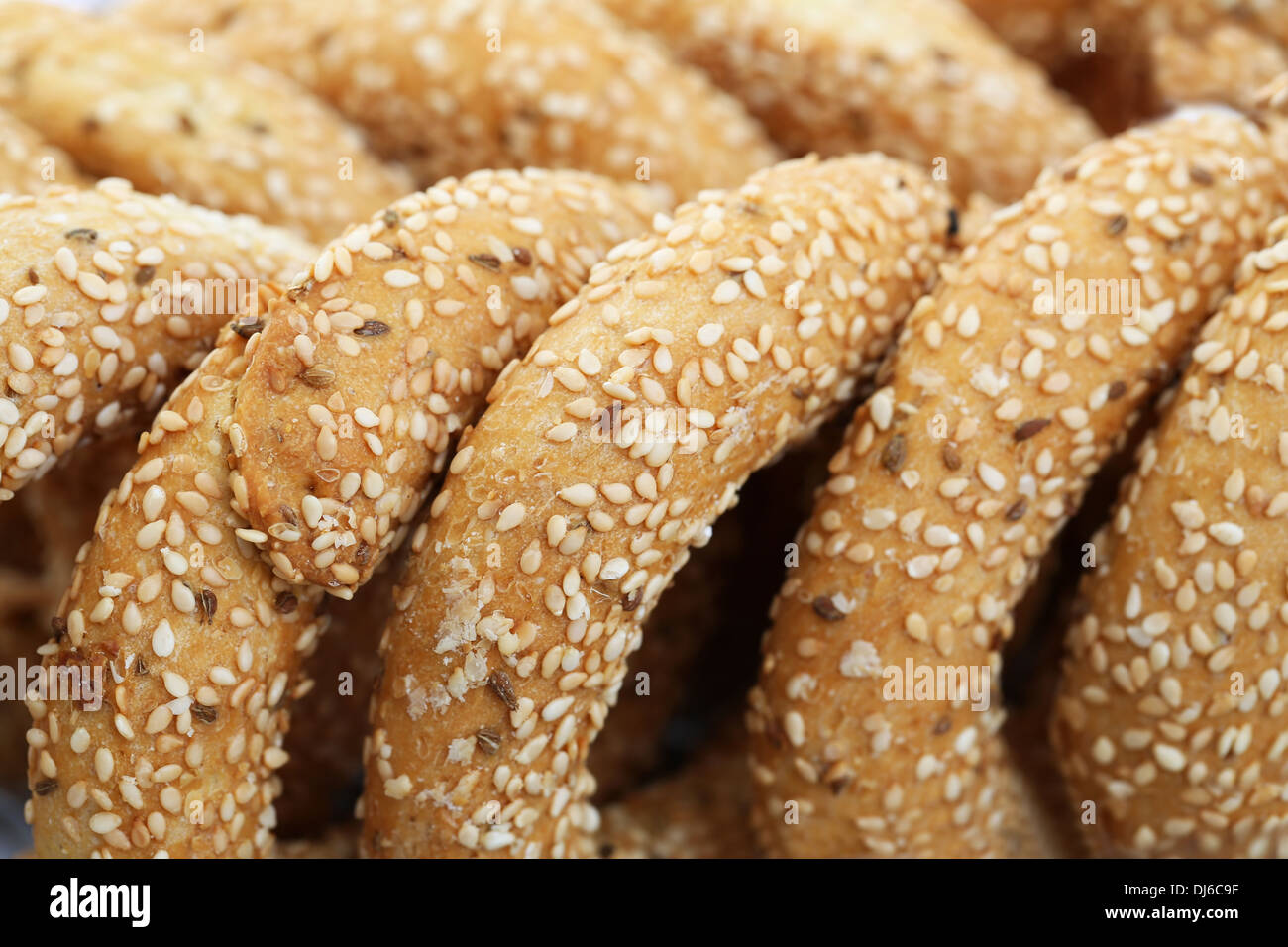 Round rusks with sesame seeds, closeup picture Stock Photo - Alamy