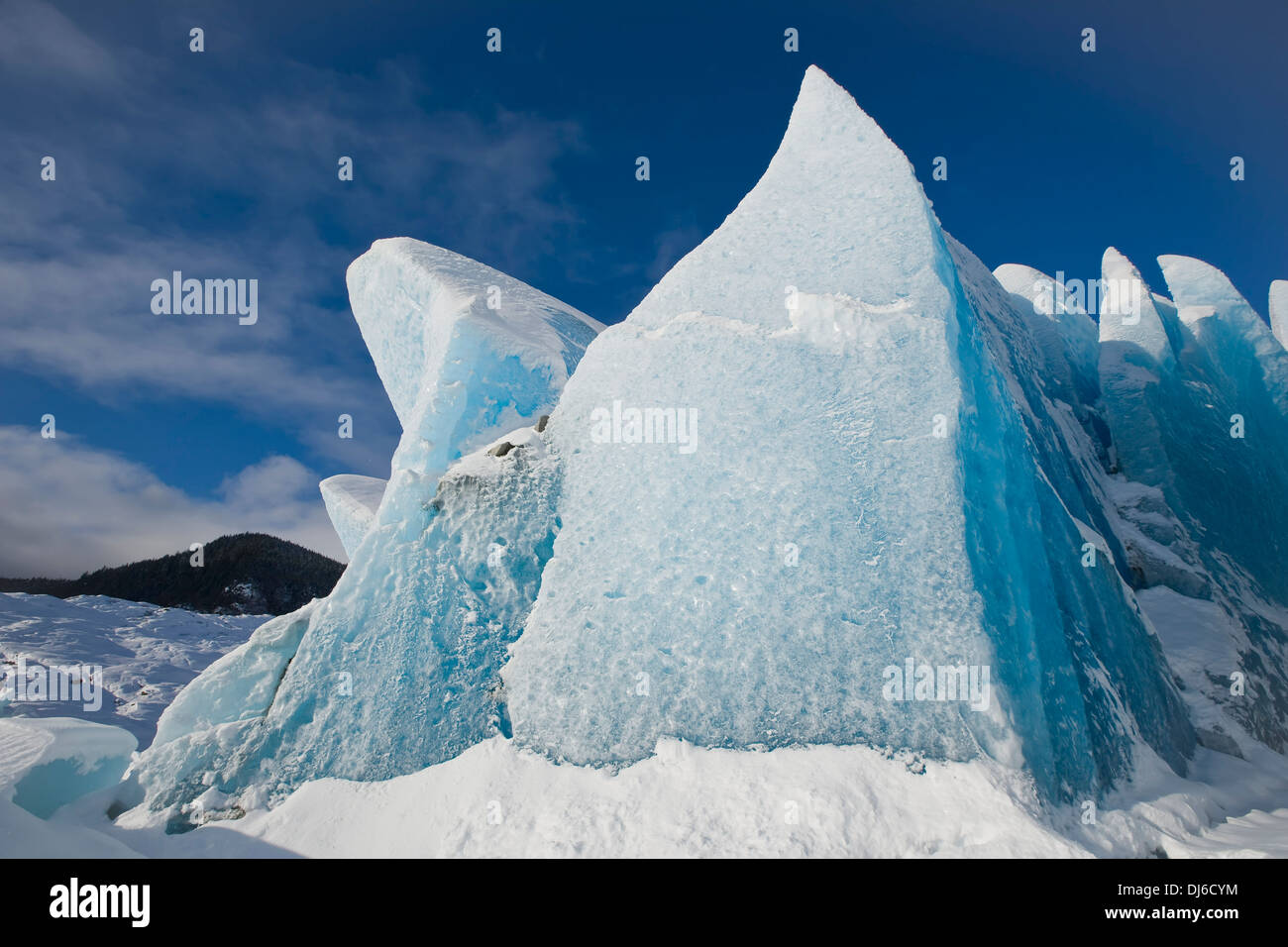Seracs At The Face Of Mendenhall Glacier Tower Over The Frozen Surface ...