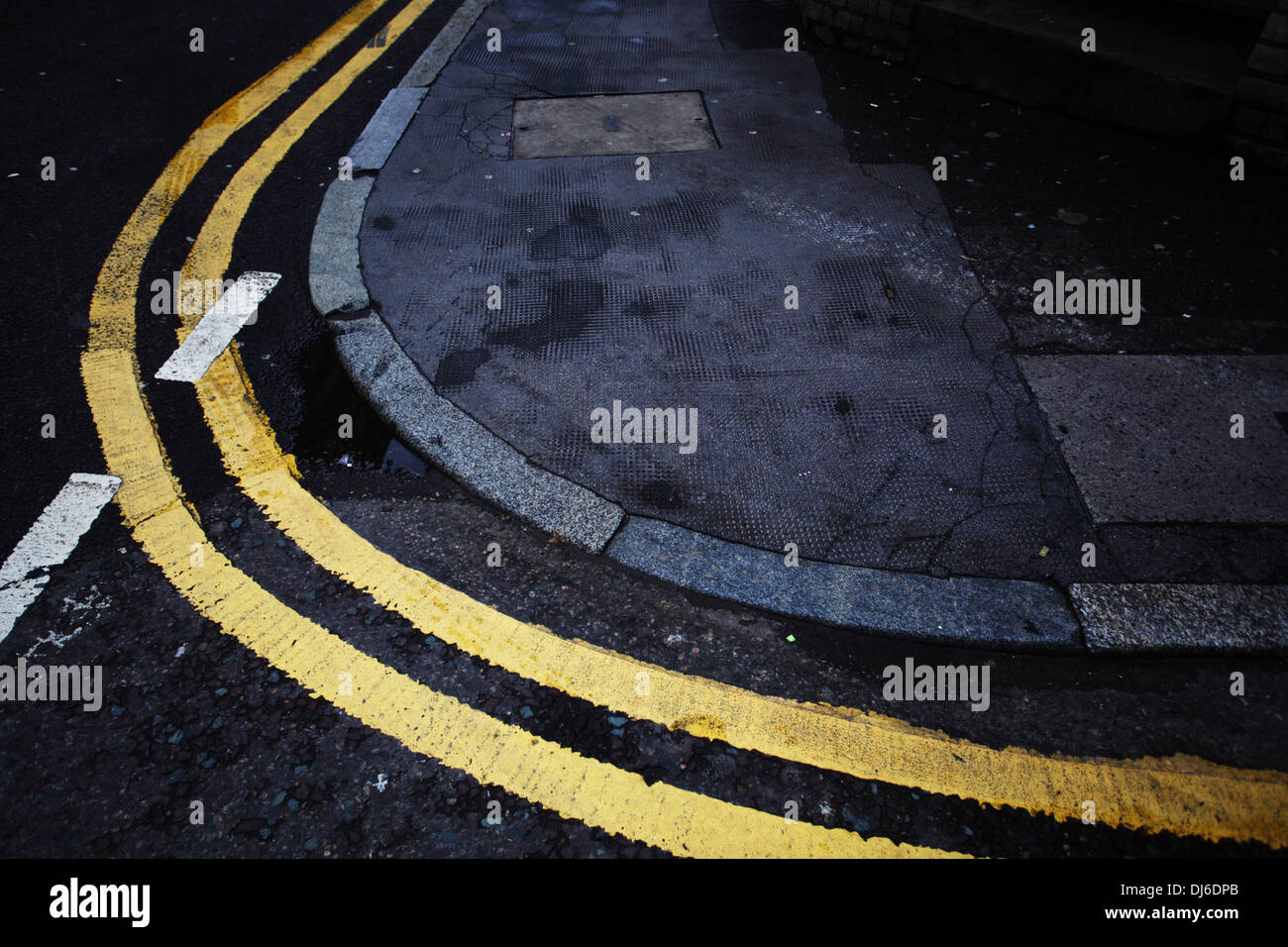 street signs and yellow lines on asphalt in london UK Stock Photo - Alamy