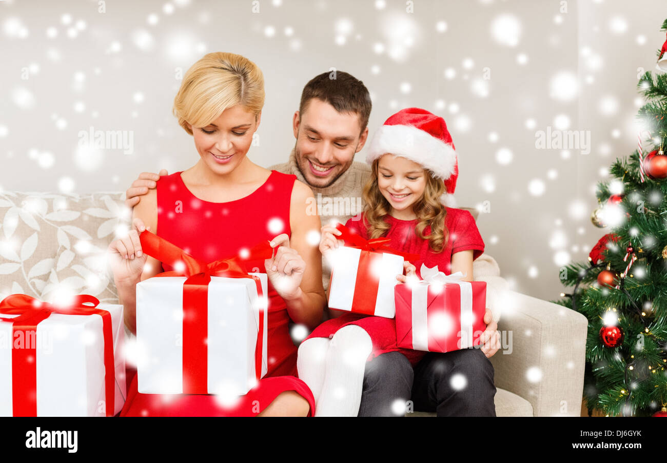 happy family opening gift boxes Stock Photo - Alamy