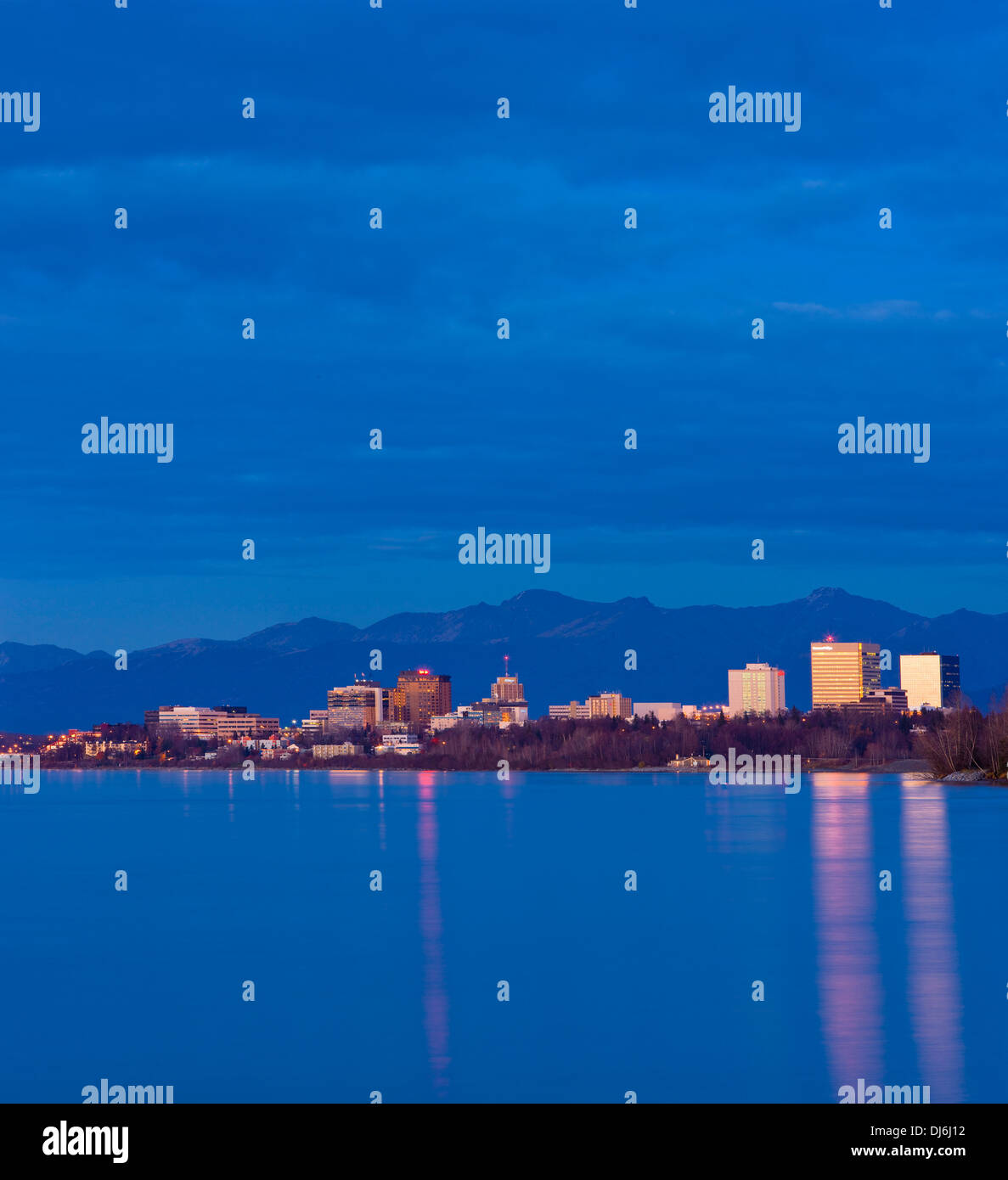 Twilight View Of The Anchorage Skyline Reflecting In The Waters Of Cook ...