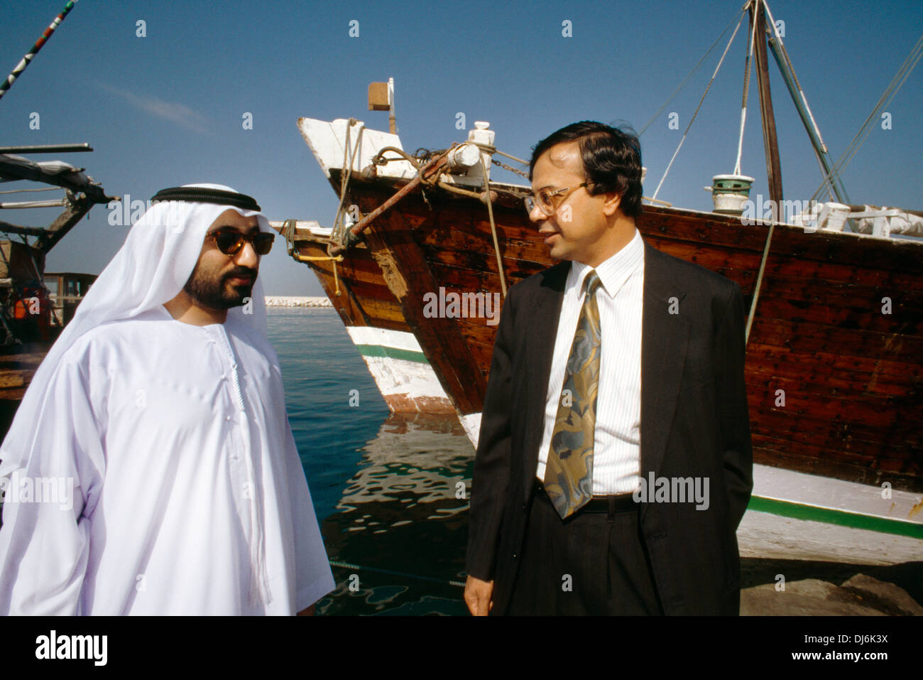 Dubai uae arab men talking hi-res stock photography and images - Alamy