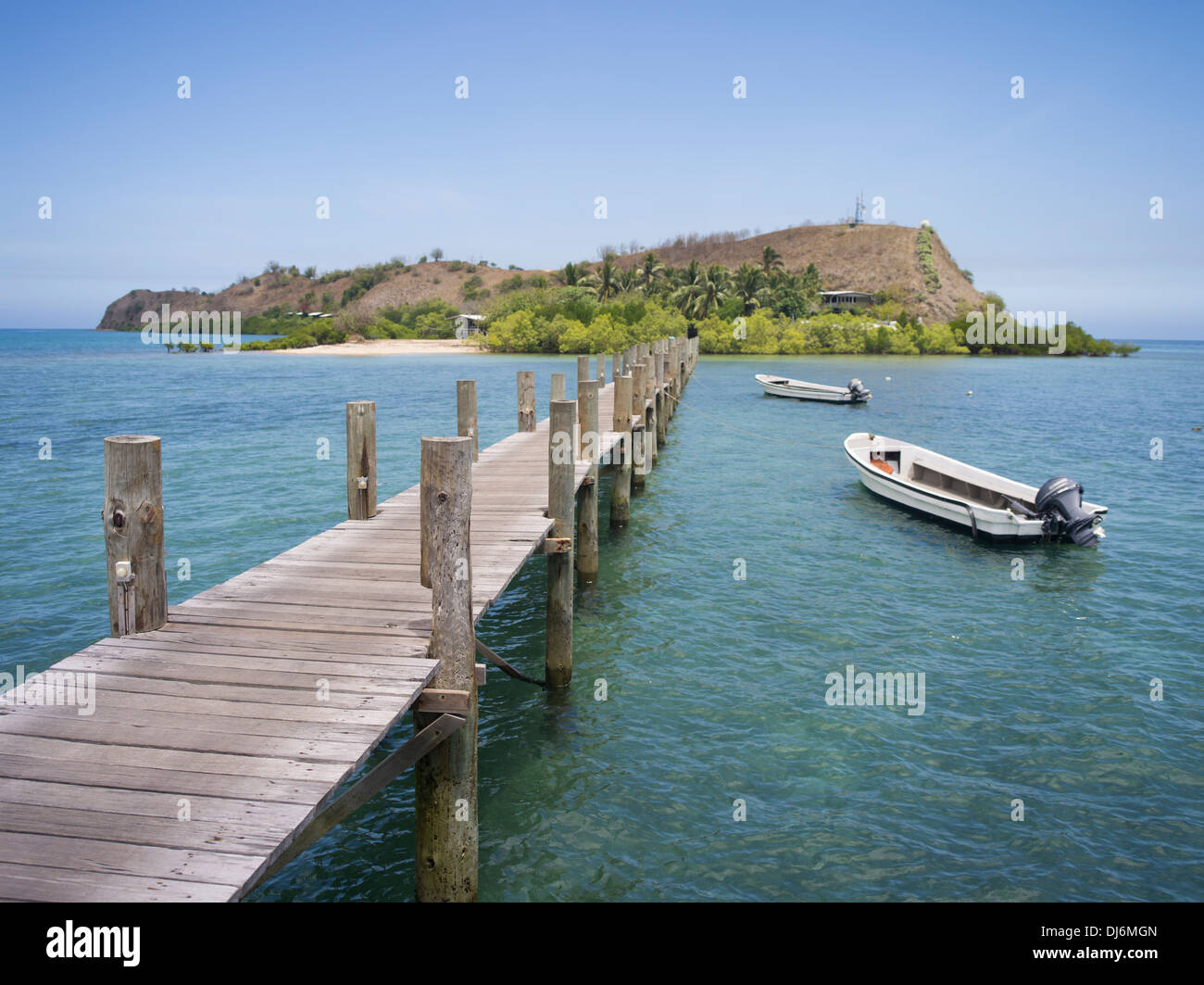 Jetty with small boats Loloata Island near Port Moresby, Papua New ...