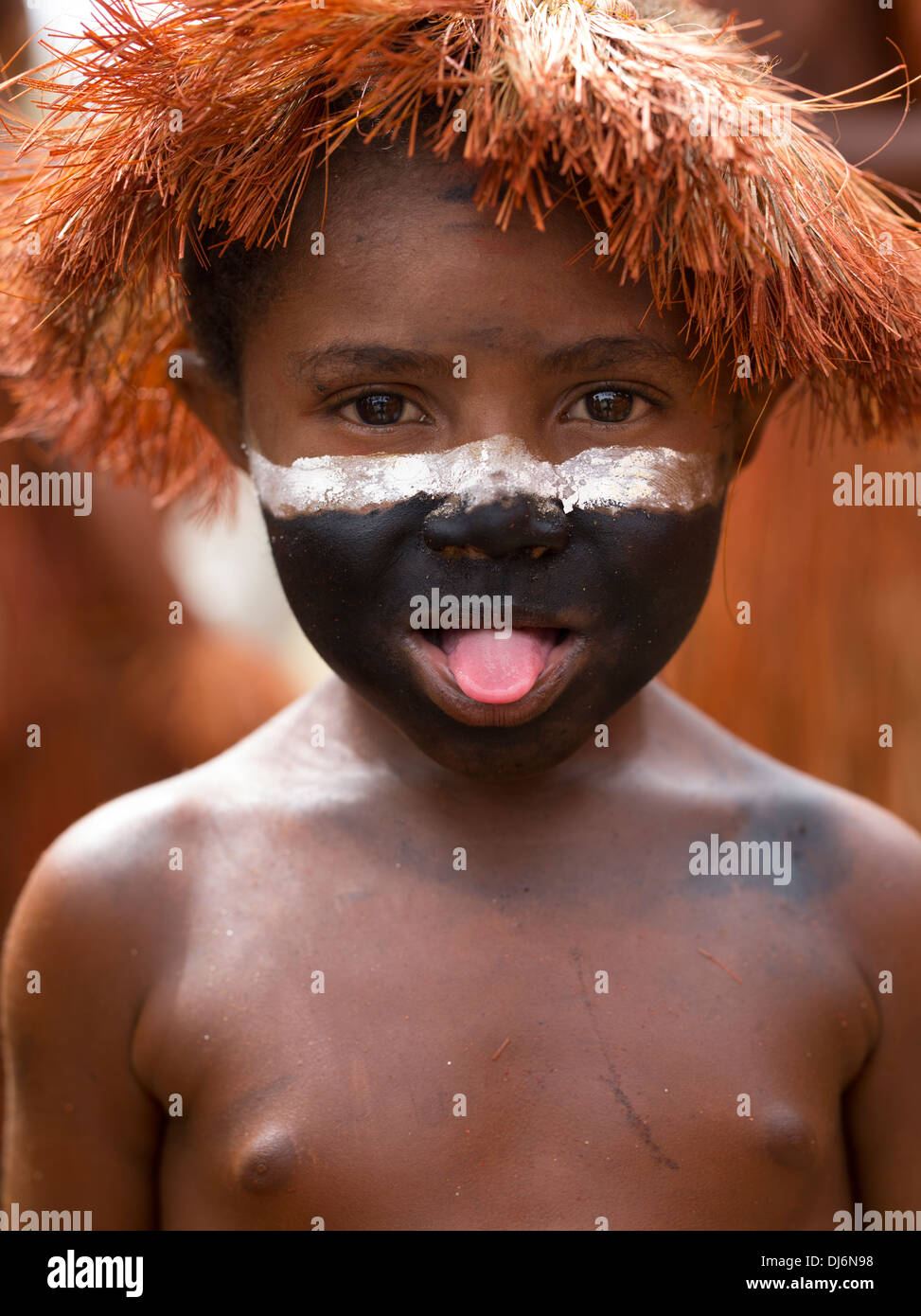 Young child of the Gomena Singsing Group, Goroka District, Eastern ... Young child of the Gomena Singsing Group, Goroka District, Eastern ...