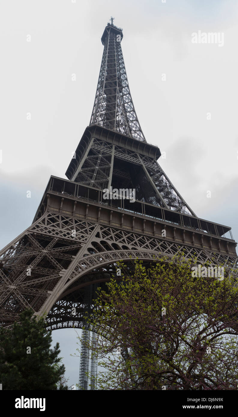 The Eiffel Tower in Paris, France on an overcast day shot at an angle ...