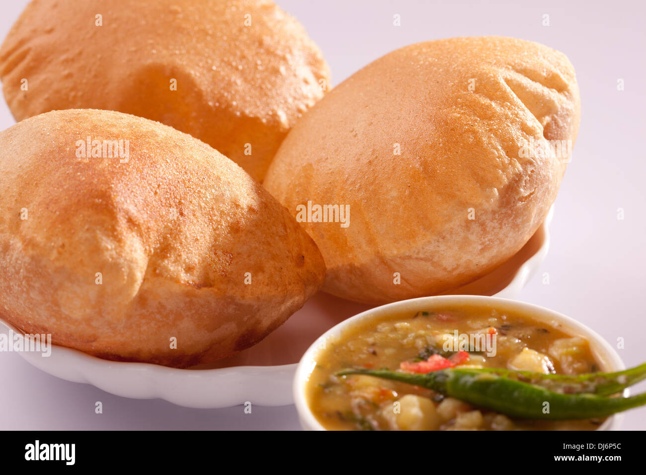 Puri - Puri is a traditional Indian classic bread savored with potato ...