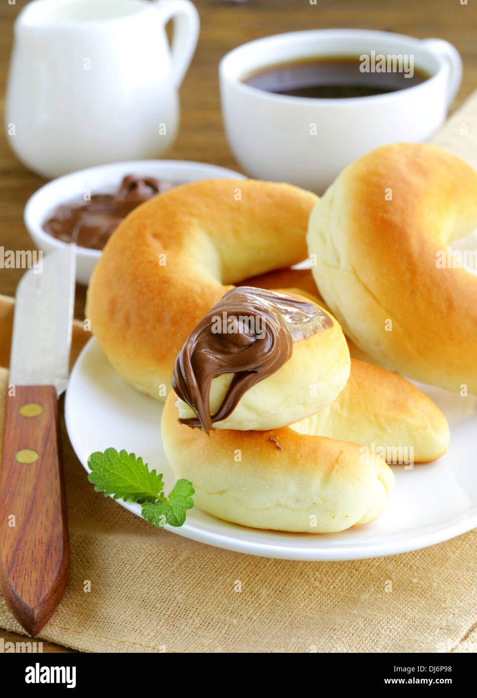 bread rolls with chocolate nut paste for breakfast Stock Photo - Alamy