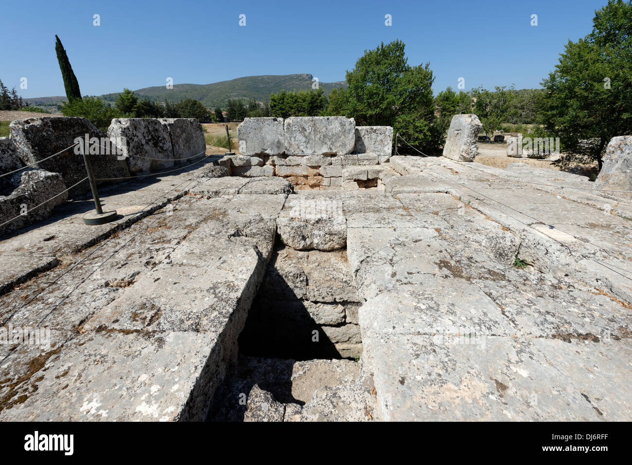 Missing paving slabs which may have been the cult statue location in ...