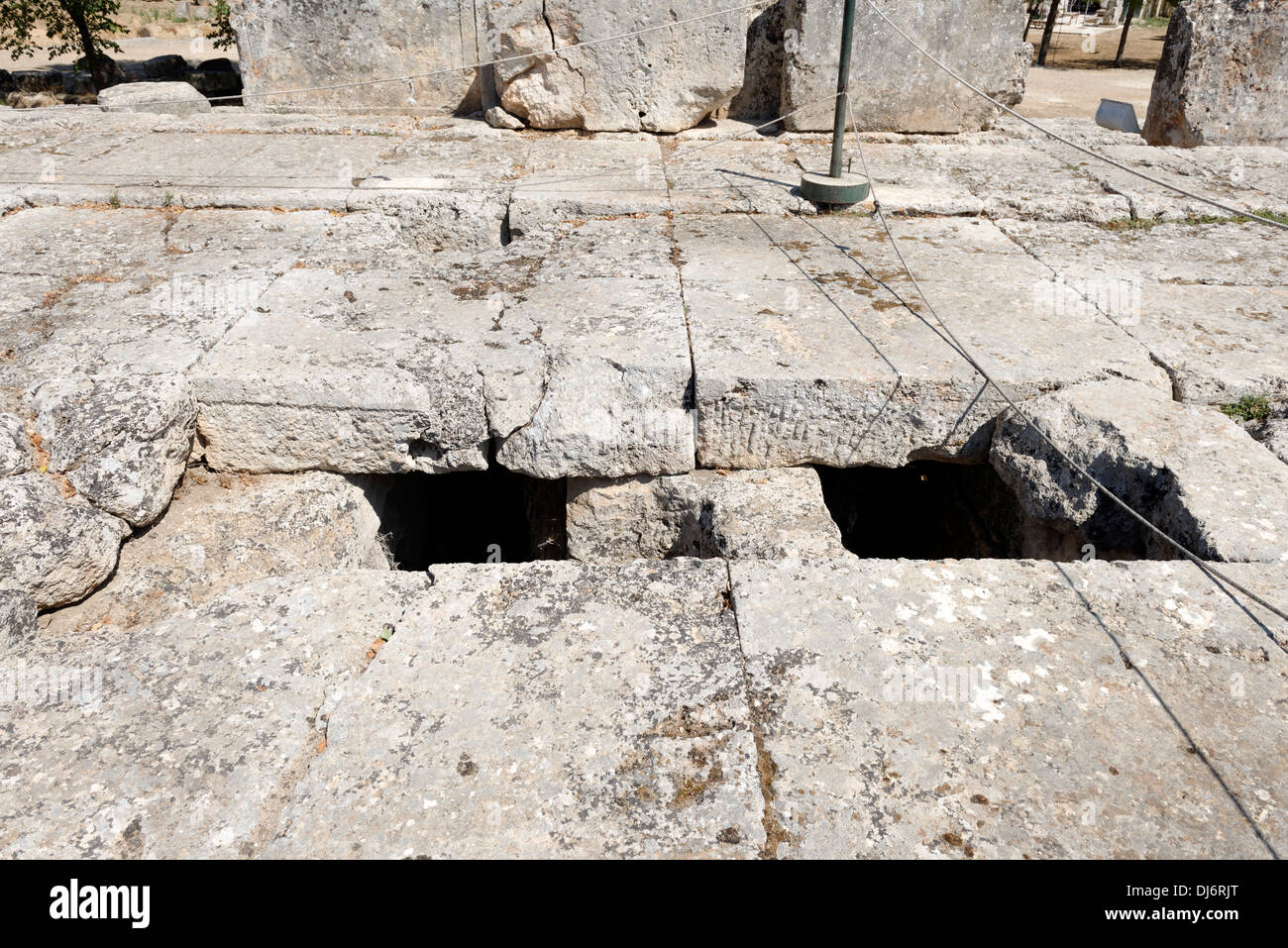 Missing paving slabs which may have been the cult statue location in ...