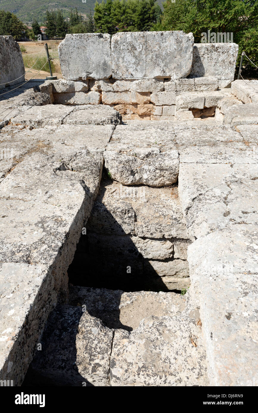 Missing paving slabs which may have been the cult statue location in ...
