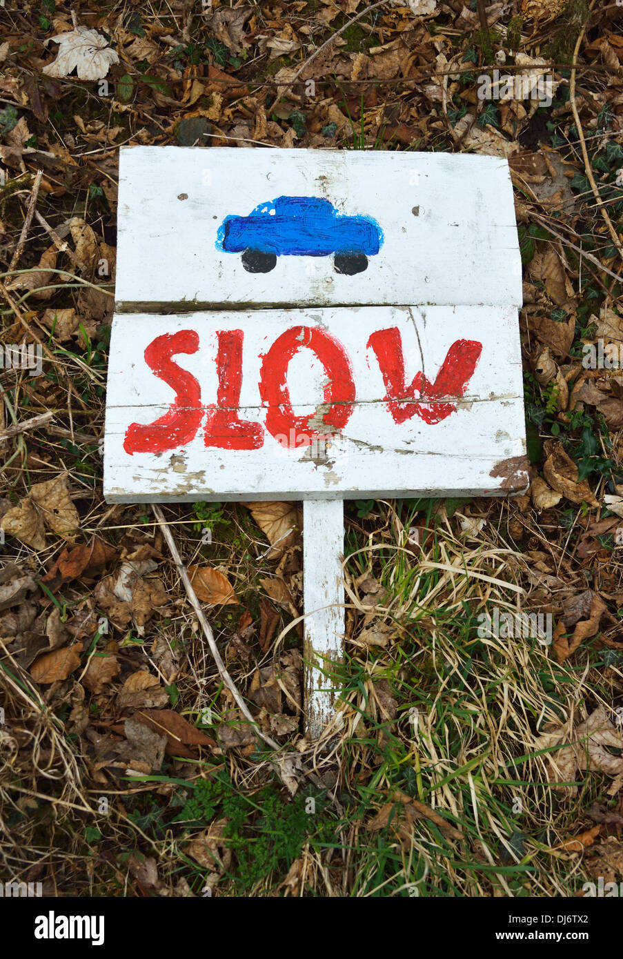Hand-painted 'SLOW' sign. Crook, Lake District National Park, Cumbria ...