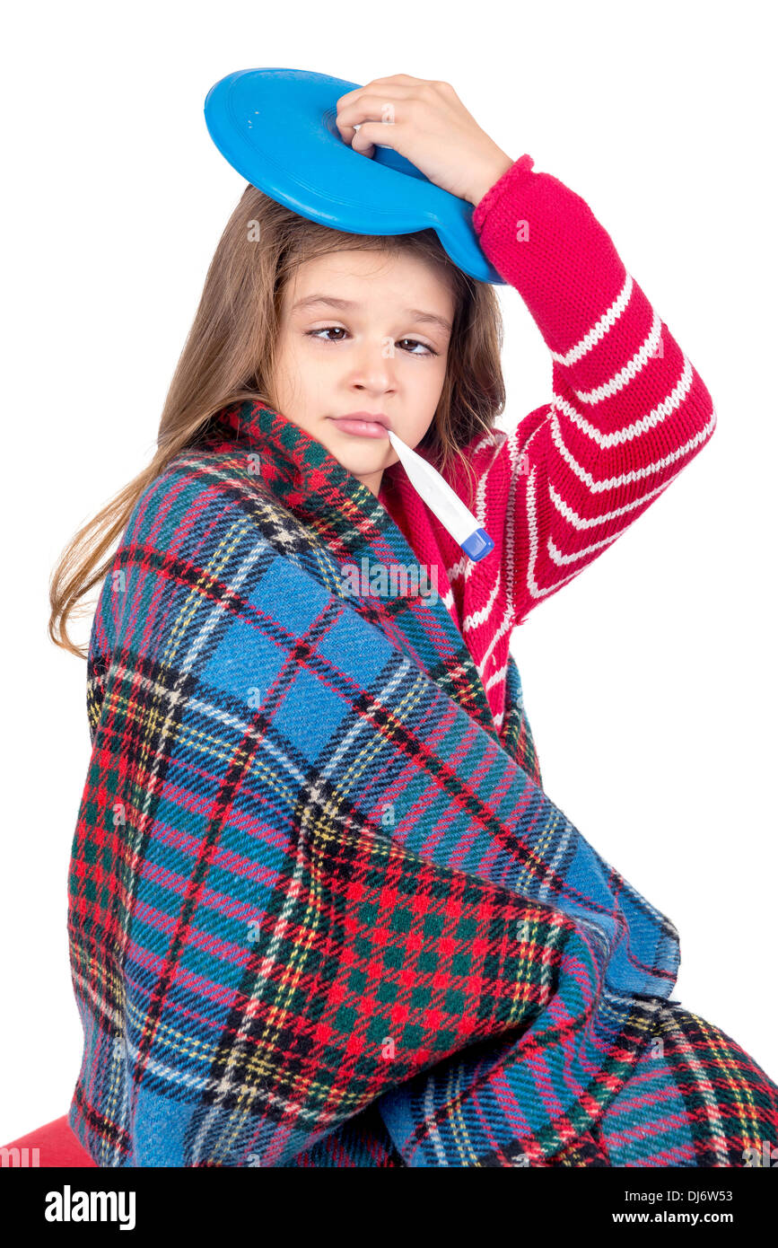 Young girl with a cold wrapped in a blanket with a thermometer Stock ...