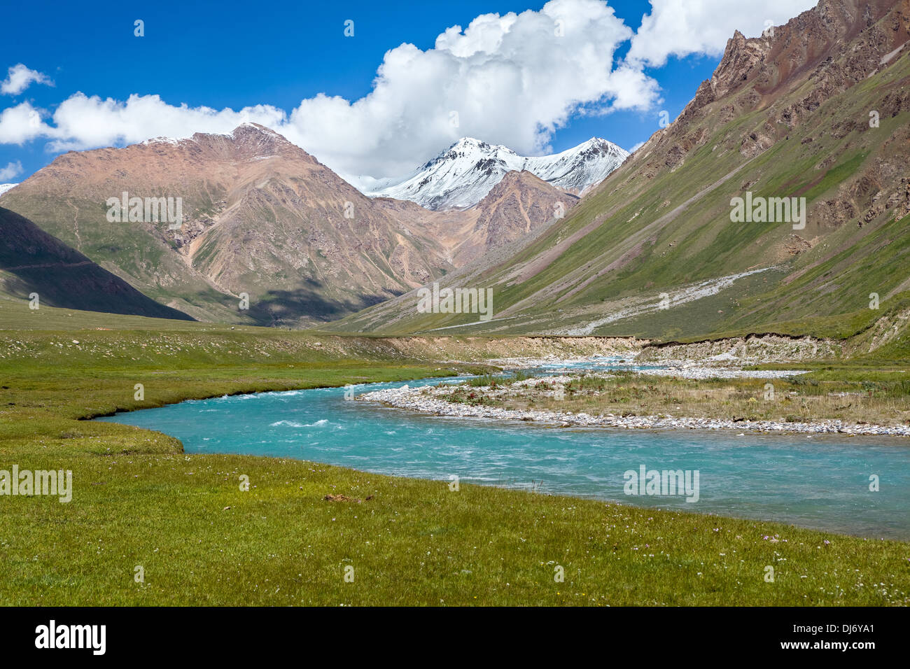Blue river and snow peaks of Tien Shan mountains Stock Photo - Alamy