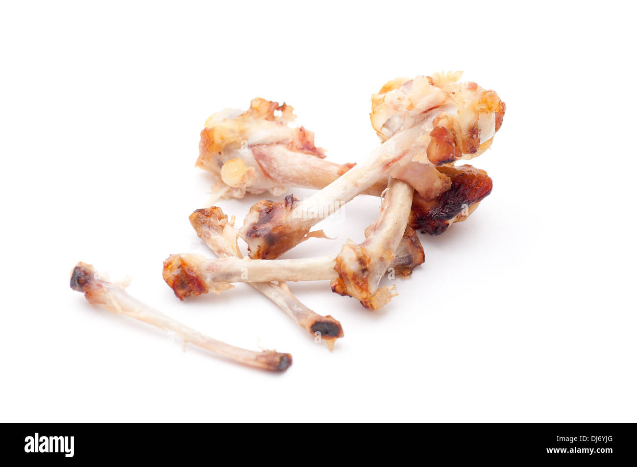 Chicken bones on white background Stock Photo - Alamy