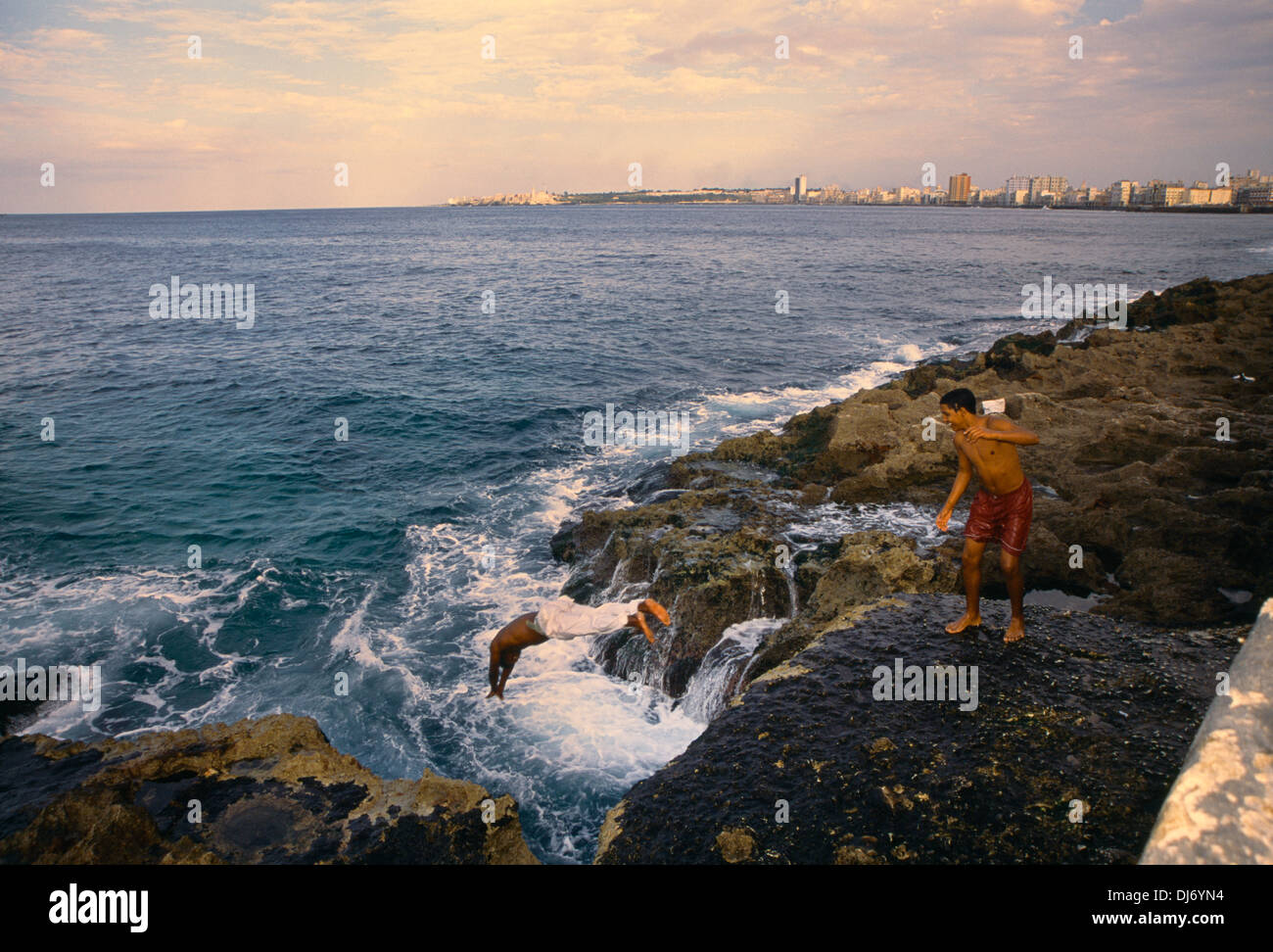 diving from the malecon, vedado, havana, cuba Stock Photo - Alamy