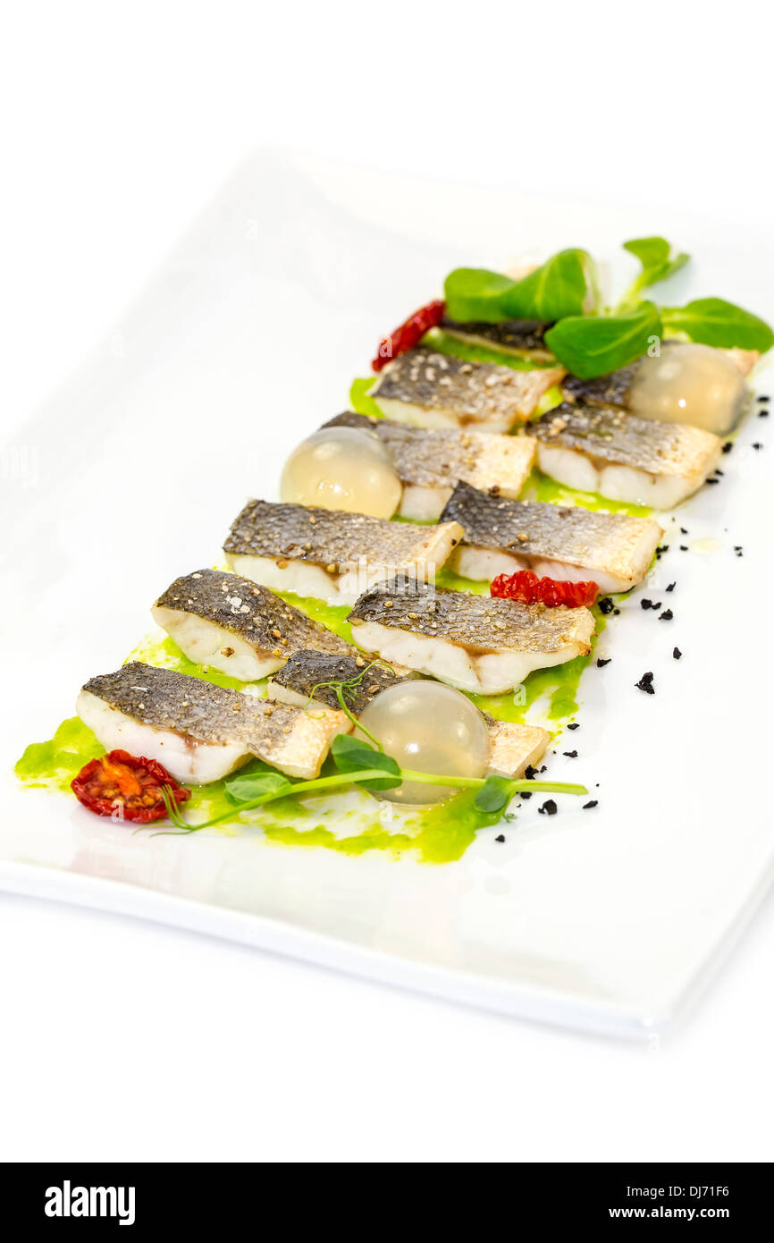 Baked black cod fish on a white background in the restaurant Stock ...