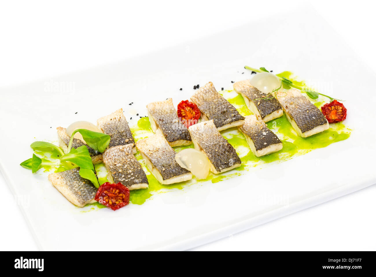 Baked black cod fish on a white background in the restaurant Stock ...