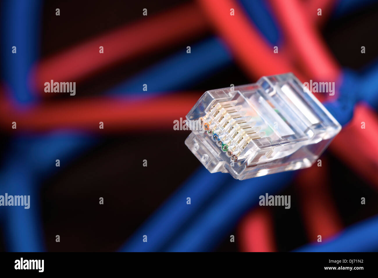 Blue ethernet cable computer and colorful background Stock Photo - Alamy