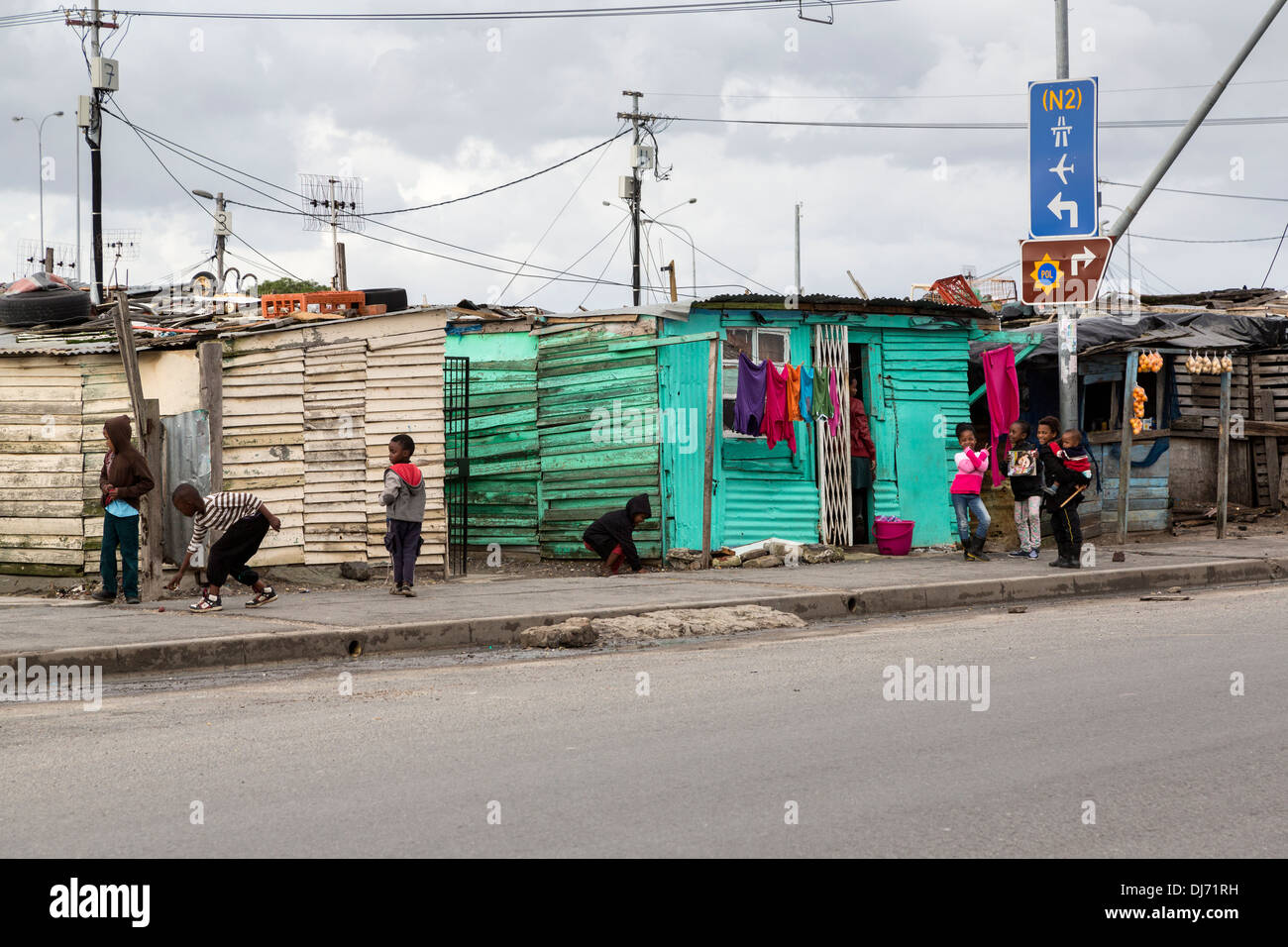 South Africa, Cape Town, Guguletu Township Roadside Scene. Children and ...
