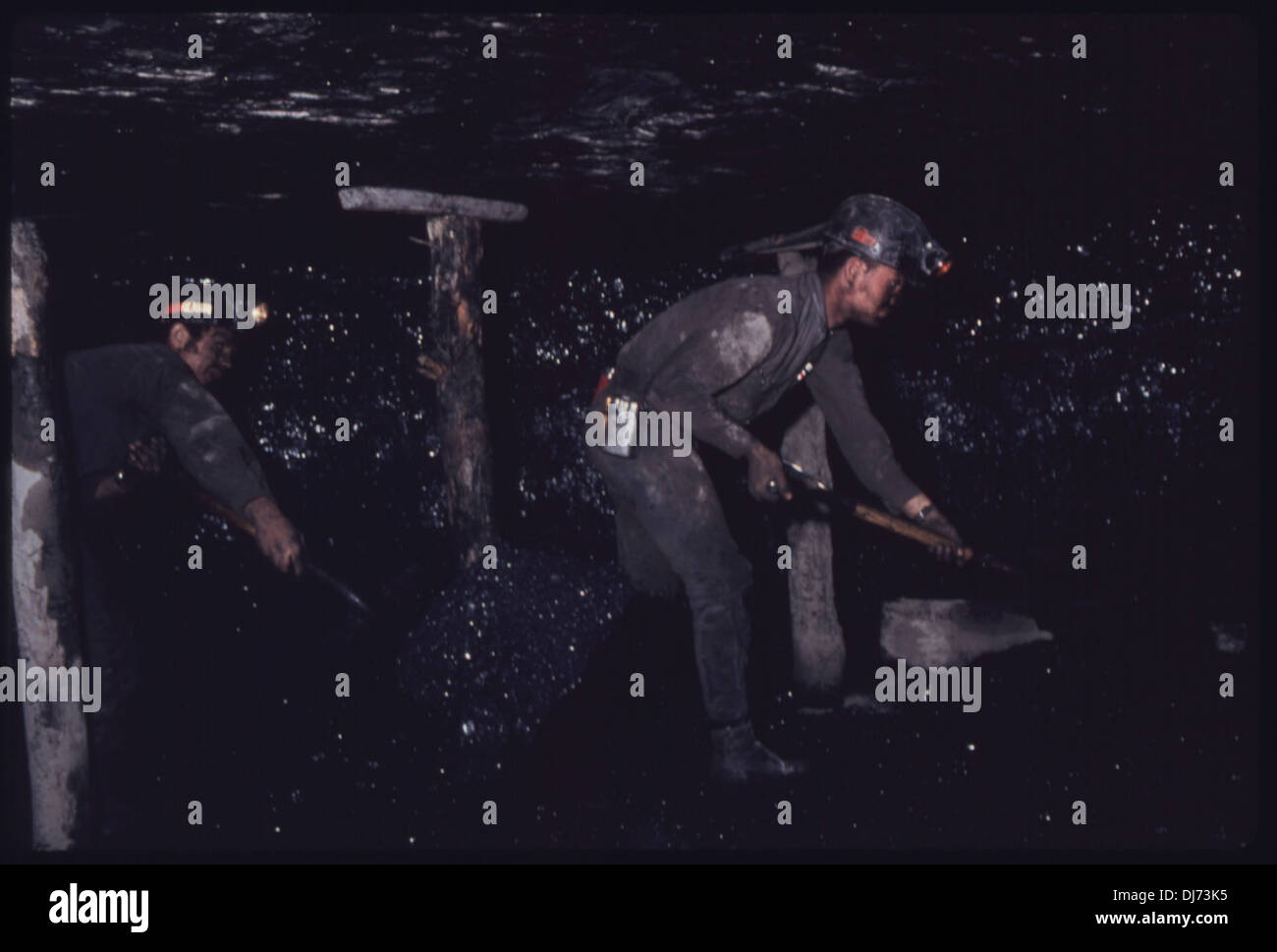 TWO MINERS ARE CLEANING OUT LOOSE COAL BY HAND SO CANVAS WALLS CAN BE ...