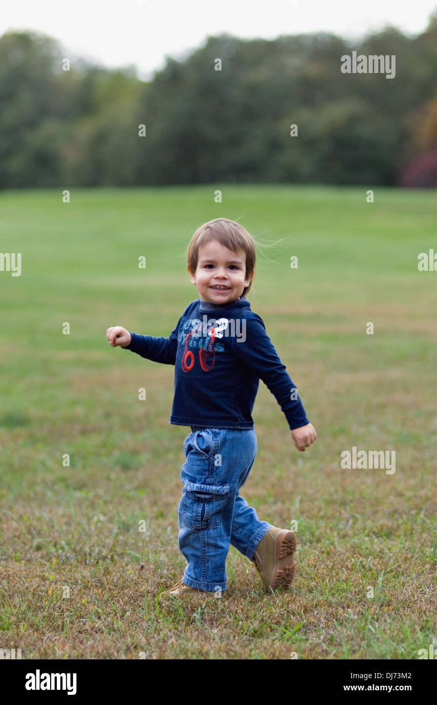 Toddler child running happy outdoors hi-res stock photography and ...
